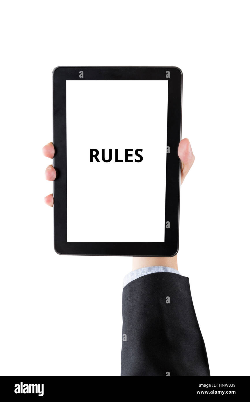 hand of businessman holding digital tablet with word rules isolated on ...