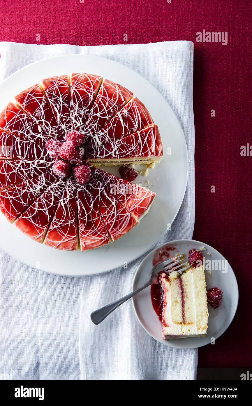 Limoncello raspberry cake on plate and tray Stock Photo - Alamy