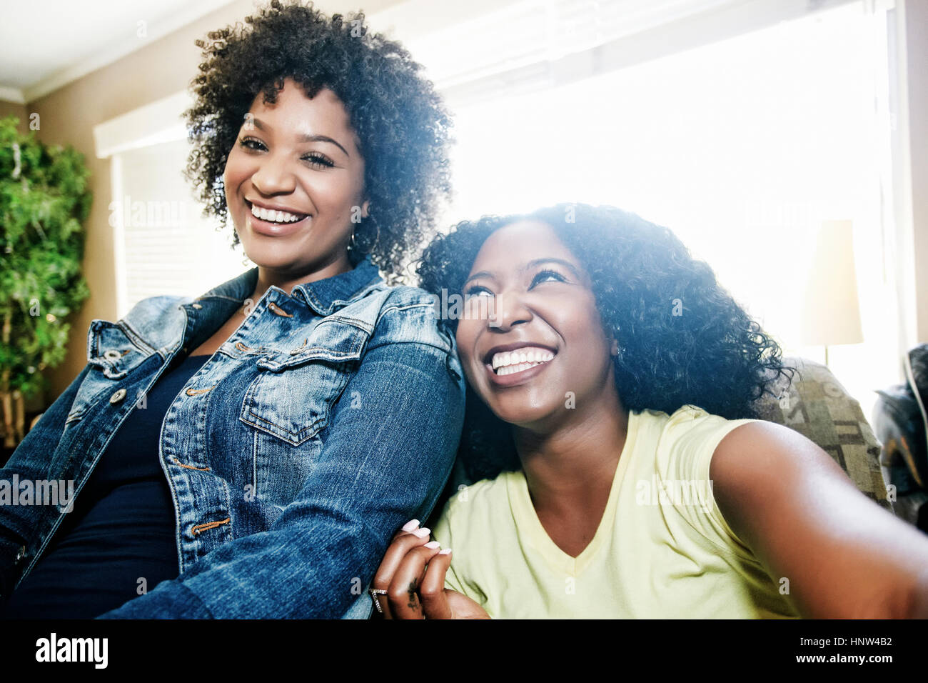 Portrait of smiling women Stock Photo - Alamy