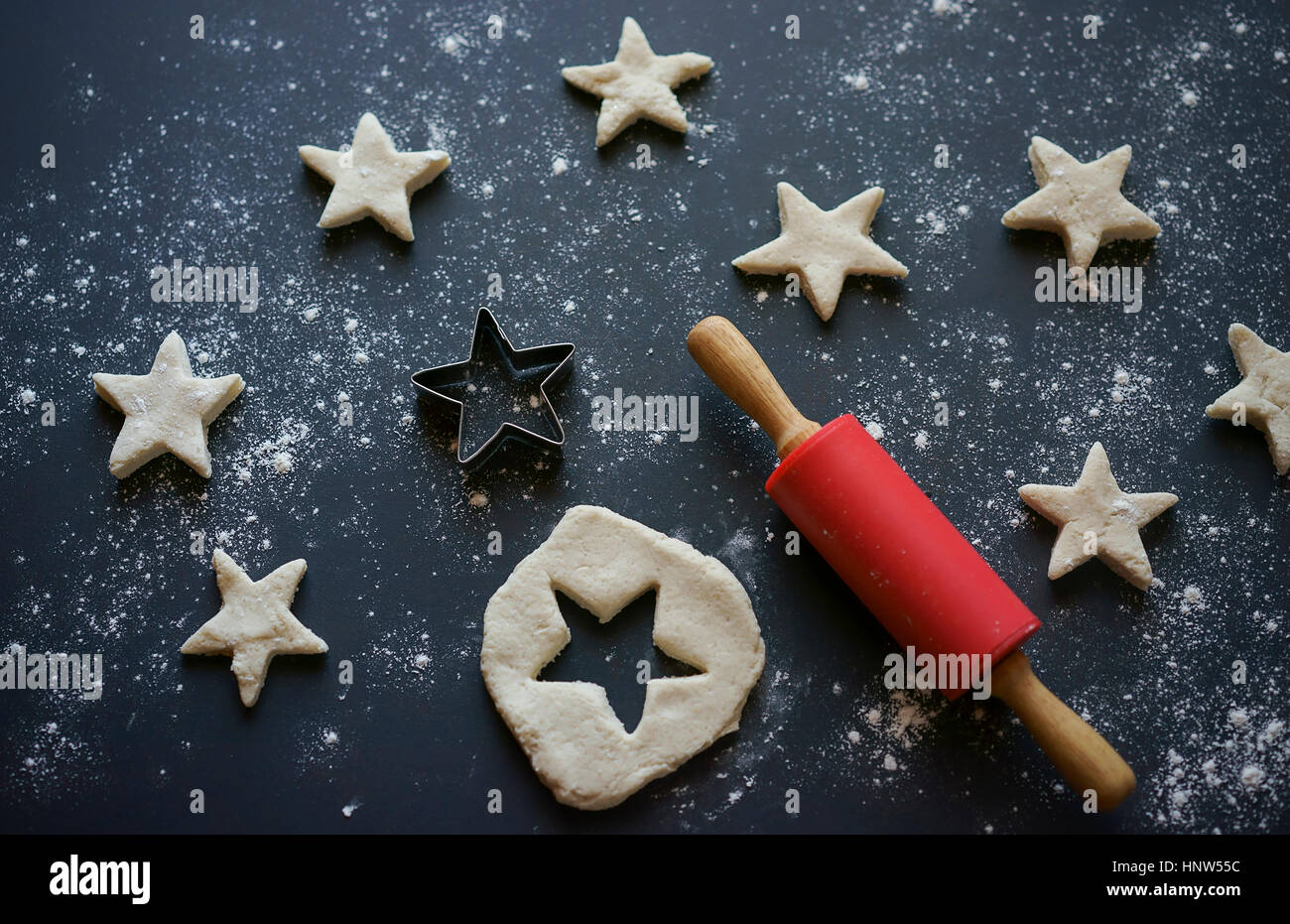 Rolling pin and star-shaped pastry cutter for cookies Stock Photo - Alamy