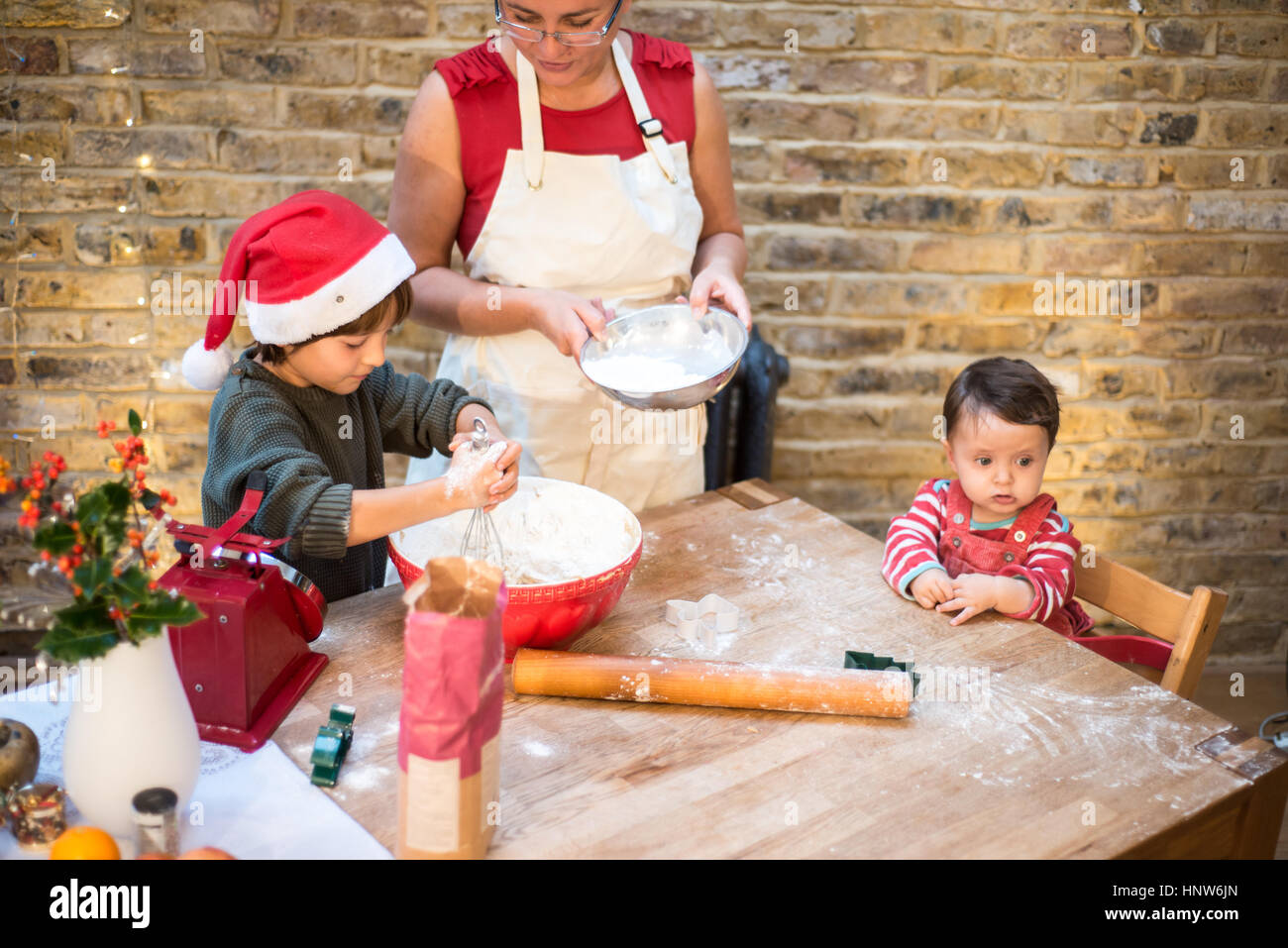 Mother and son making Christmas cookies at home Stock Photo - Alamy