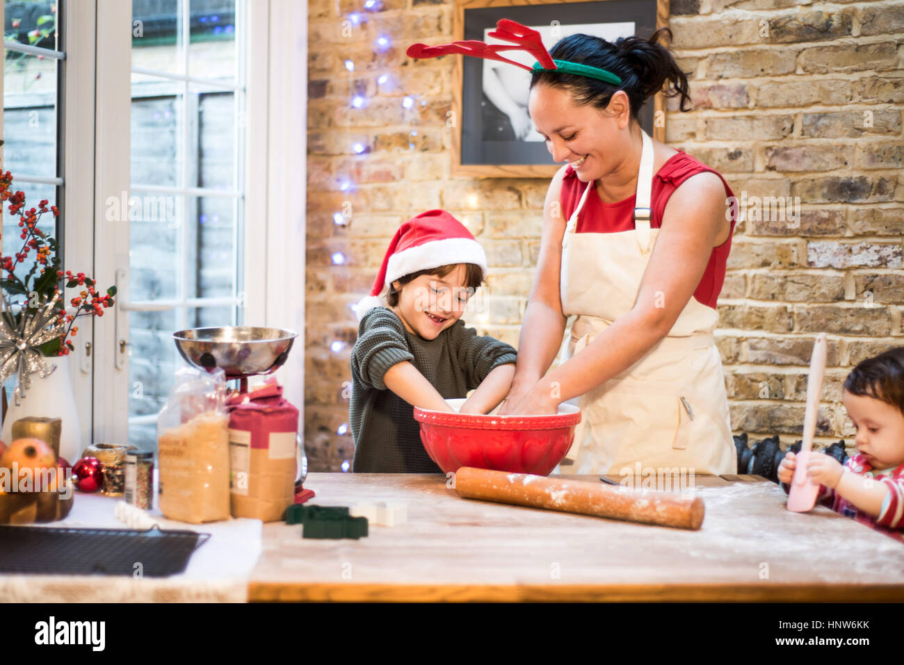 Mother and son making Christmas cookies at home Stock Photo - Alamy