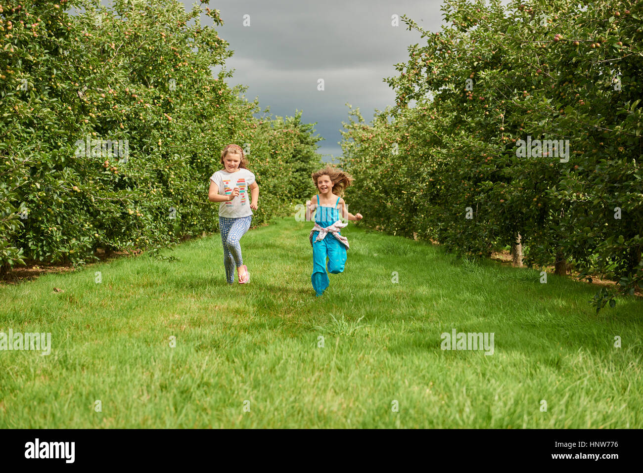 Two girls running on rural hi-res stock photography and images - Alamy