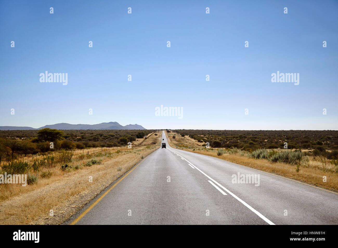 Landscape and straight highway, Namibia, Africa Stock Photo - Alamy