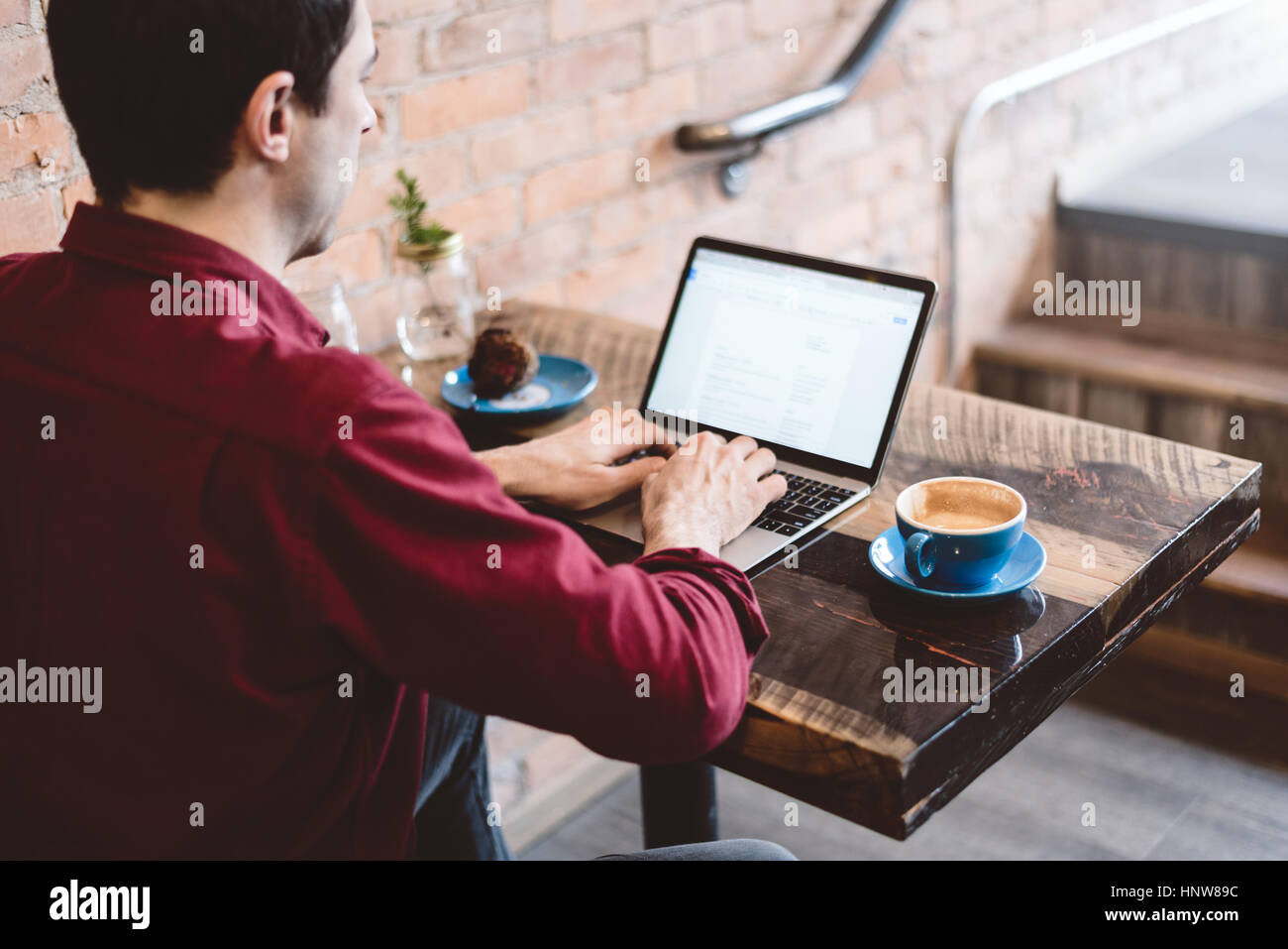 Man working at computer brick hi-res stock photography and images - Alamy