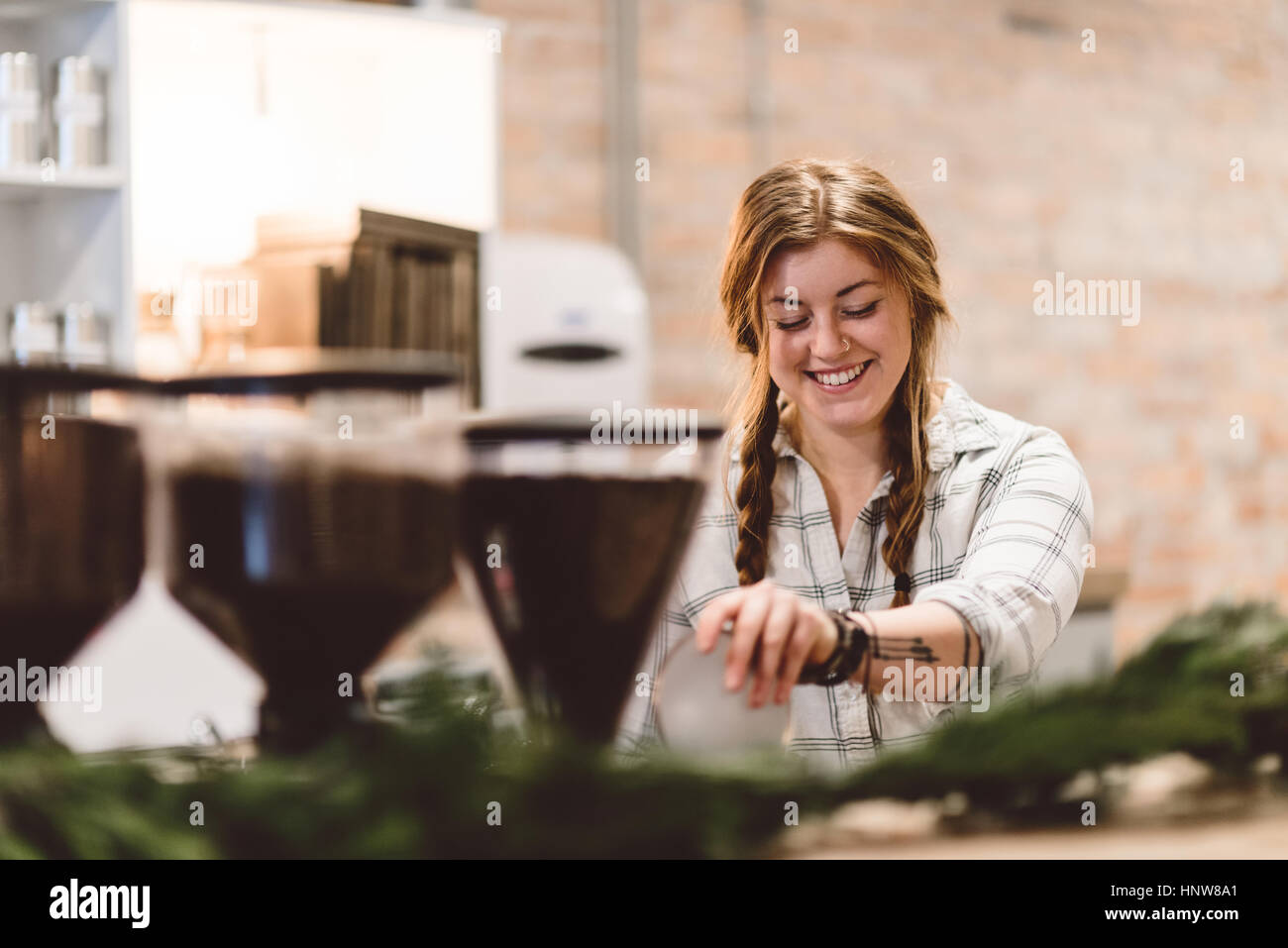 Barista preparing coffee in cafe Stock Photo - Alamy