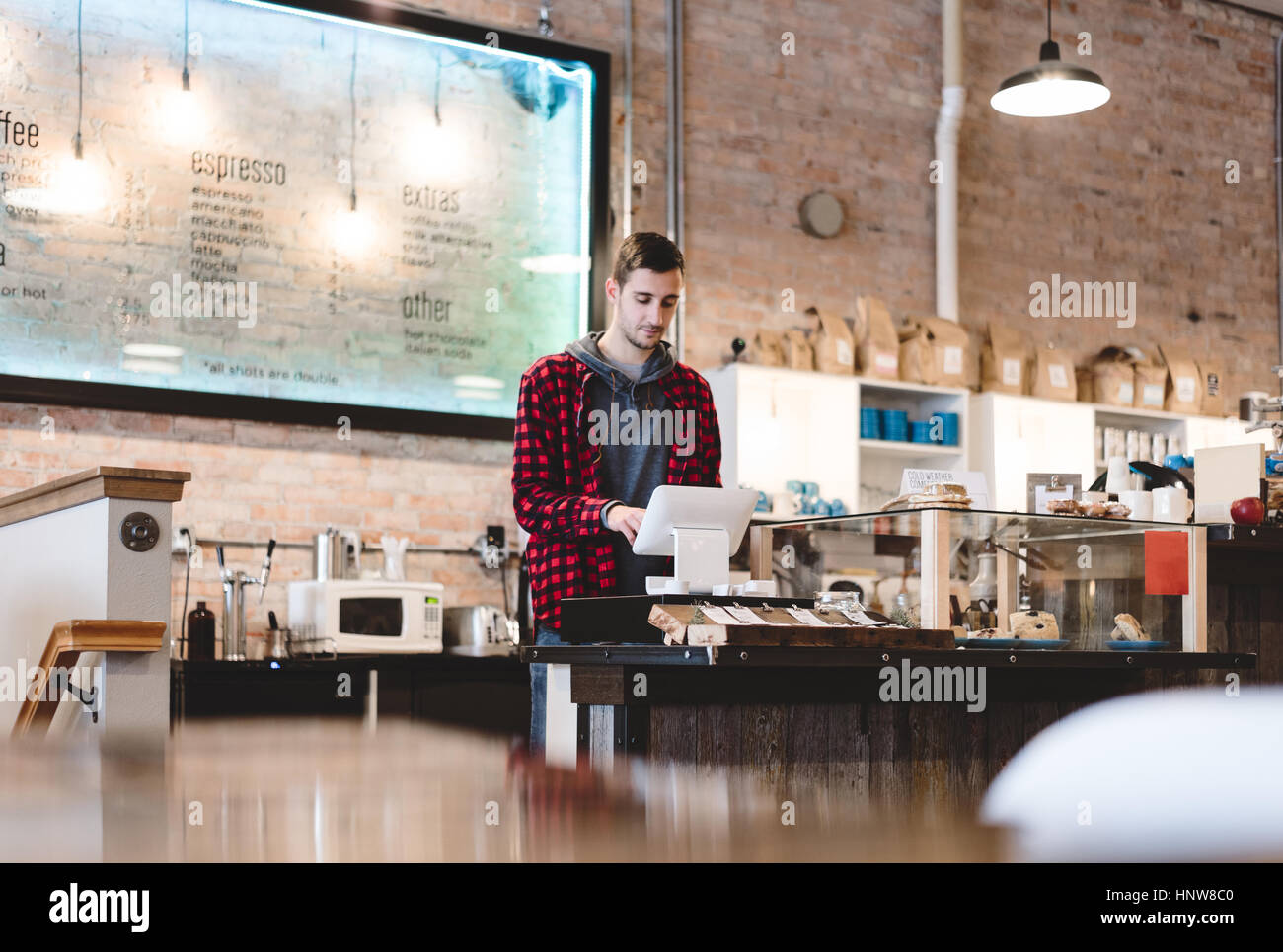 Man cash register hi-res stock photography and images - Alamy