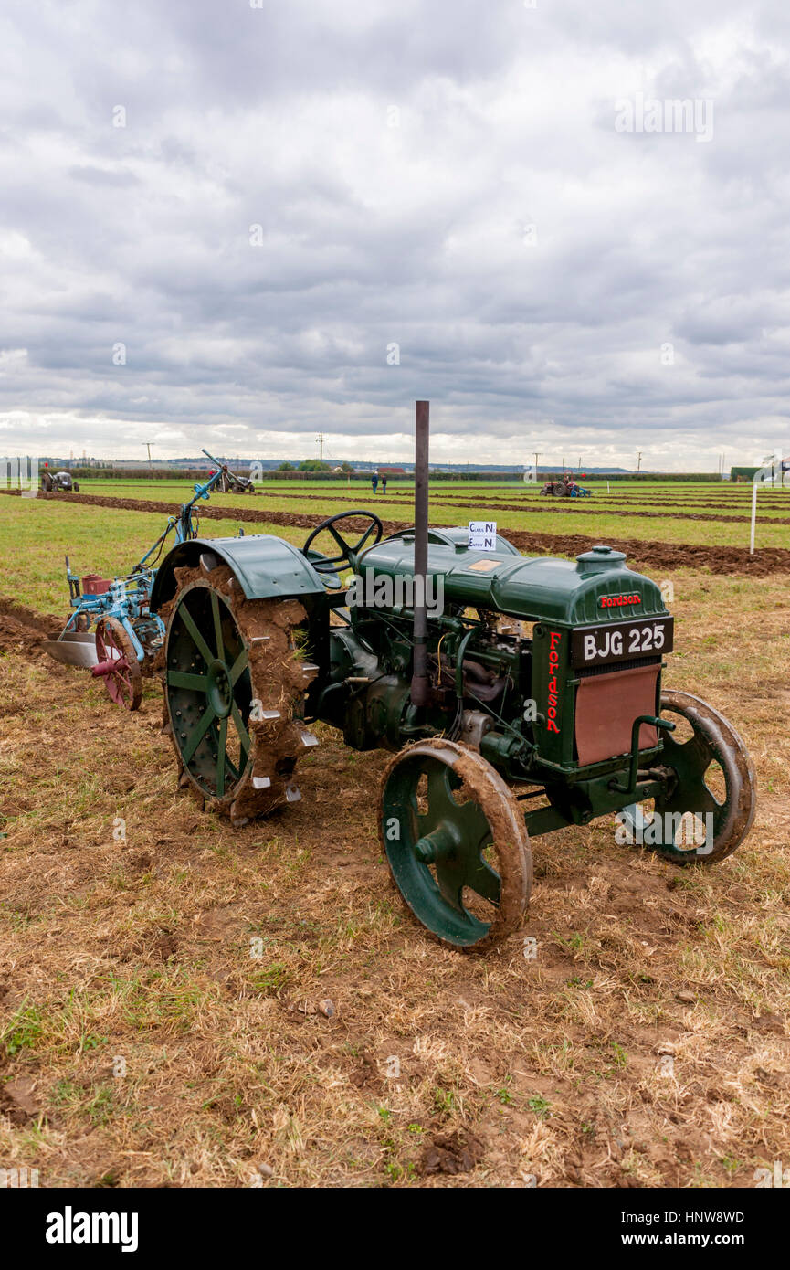 Tractors ploughing at a ploughing match at Cliffe near gravesned Kent ...