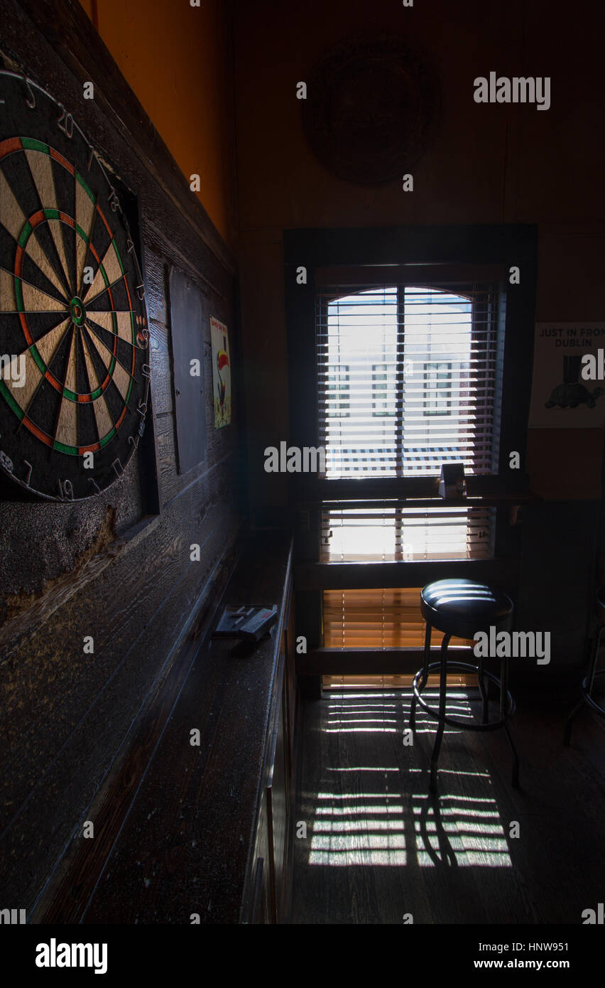 Gaming room with dart boards Stock Photo - Alamy