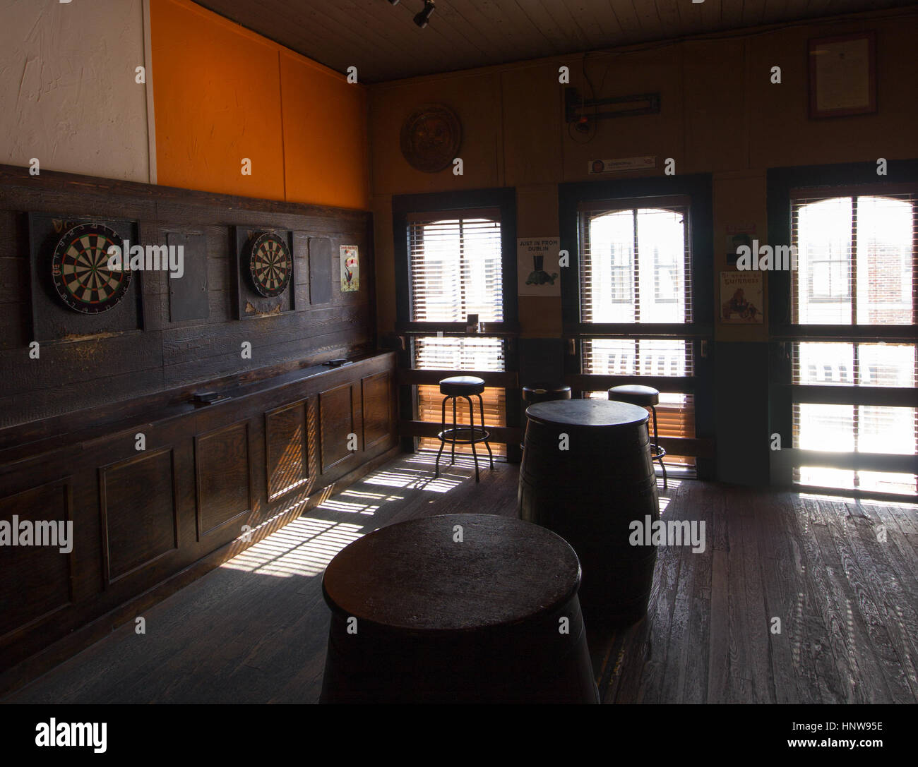 Gaming room with dart boards, daylight shot Stock Photo - Alamy