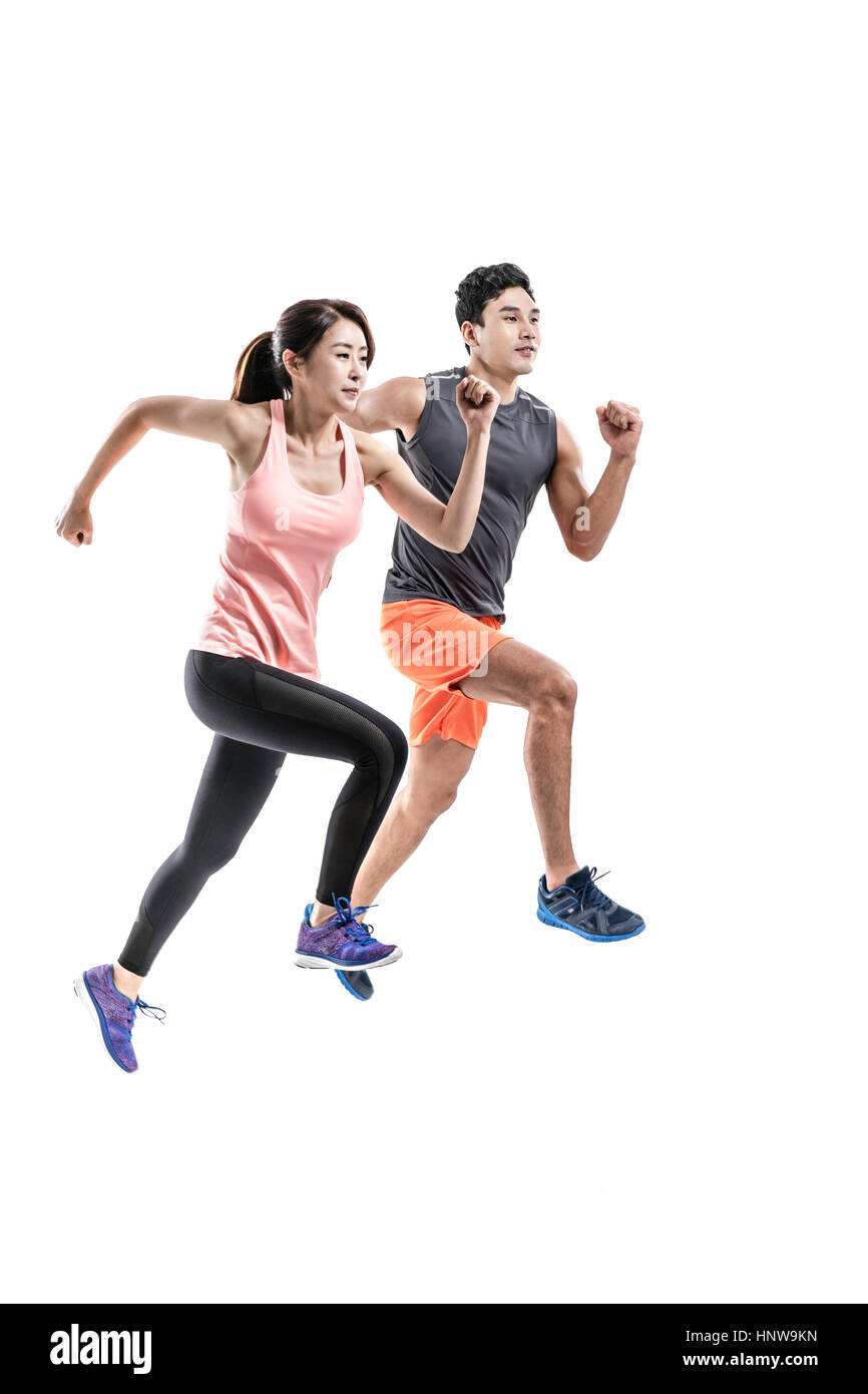 Man and woman running people hi-res stock photography and images - Alamy