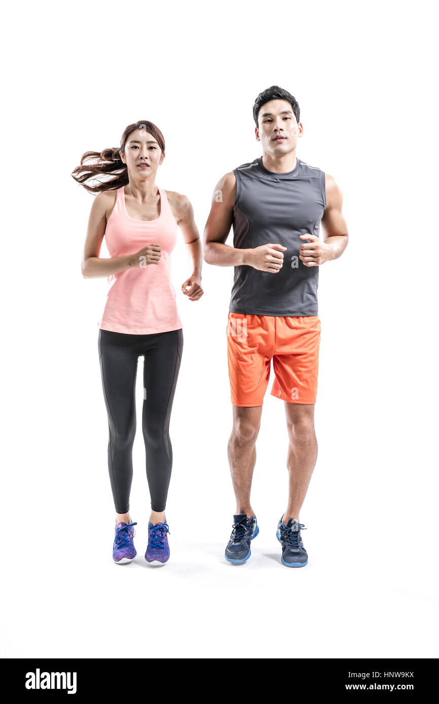 Man and woman in sportswears running Stock Photo - Alamy