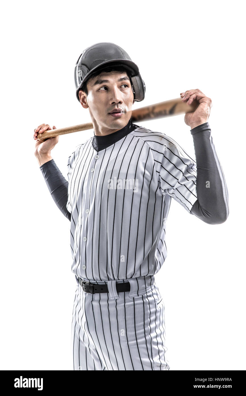 Baseball player with a bat posing Stock Photo - Alamy