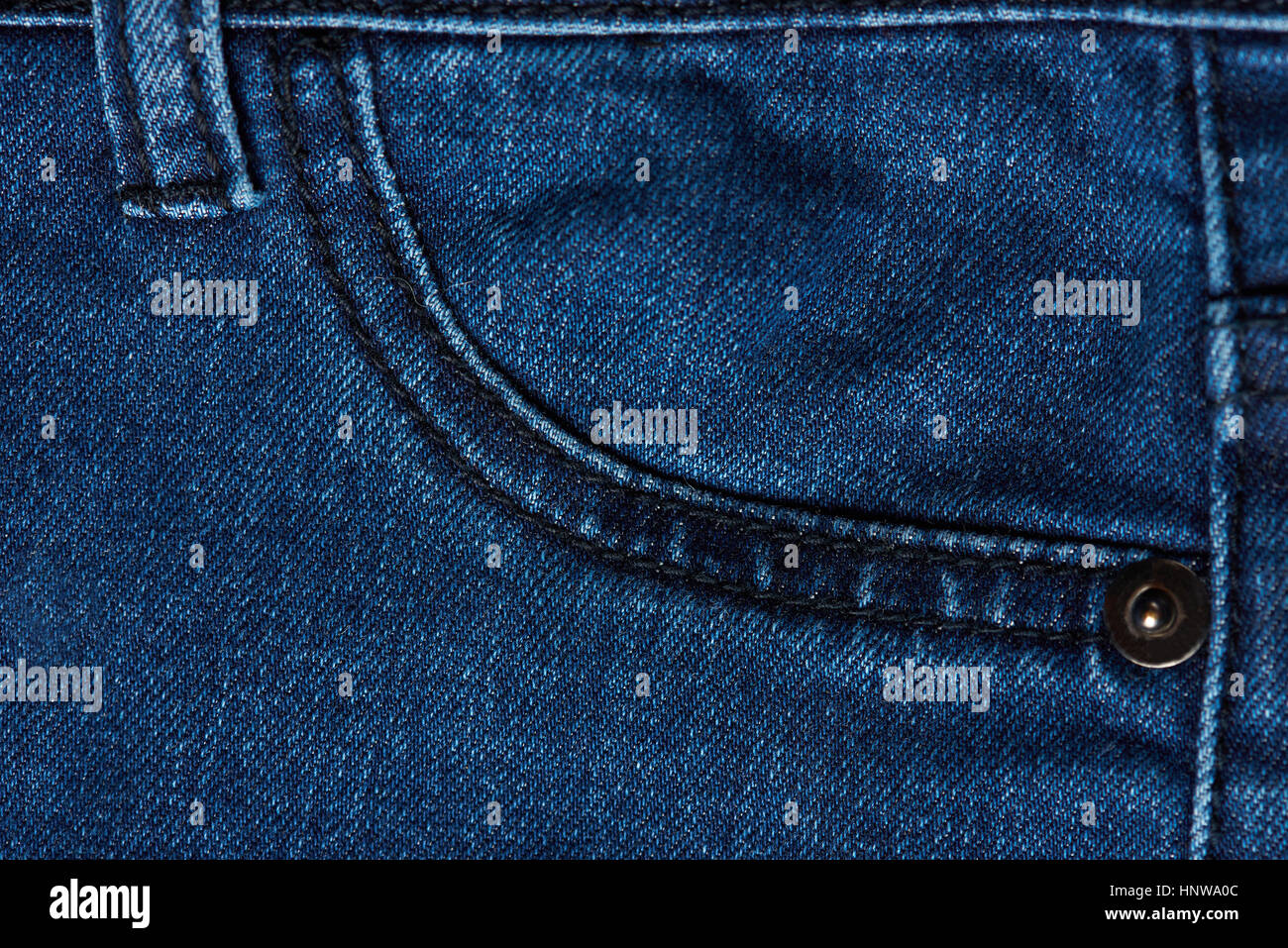 Close up of dark blue jeans pocket. Macro of jeans texture pocket Stock ...