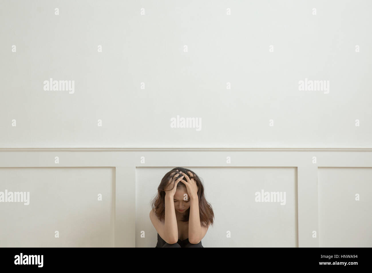 Portrait of young stressful woman Stock Photo - Alamy