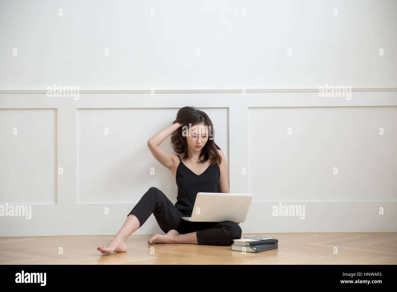 Young woman bored Stock Photo - Alamy