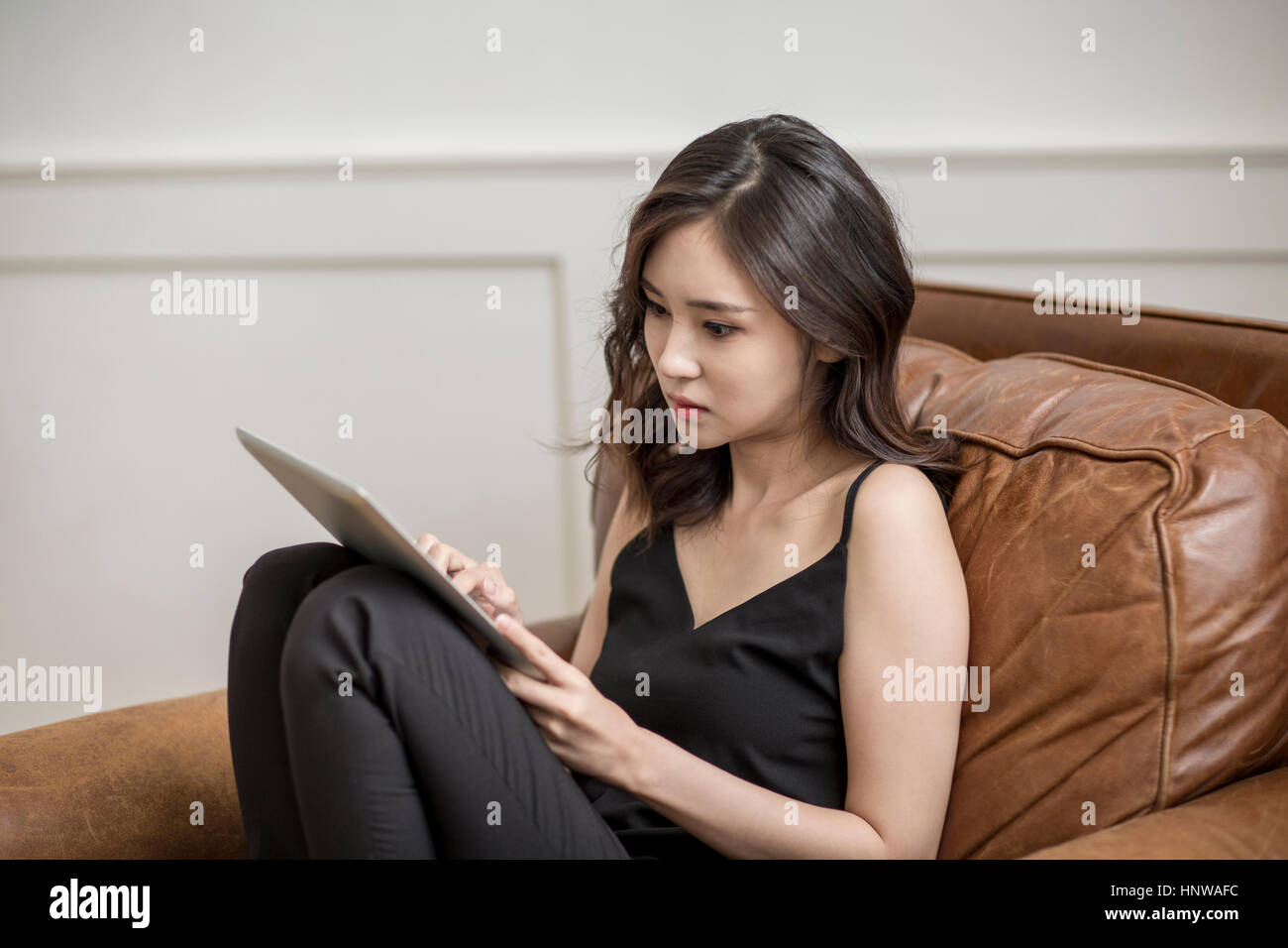 Young woman bored Stock Photo - Alamy