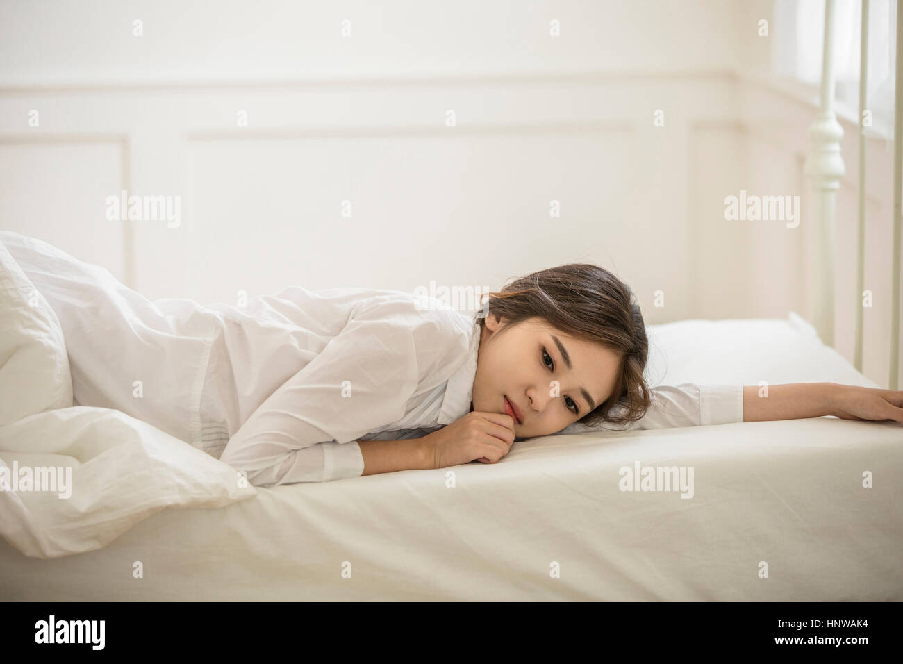 Woman bed clothes hi-res stock photography and images - Alamy