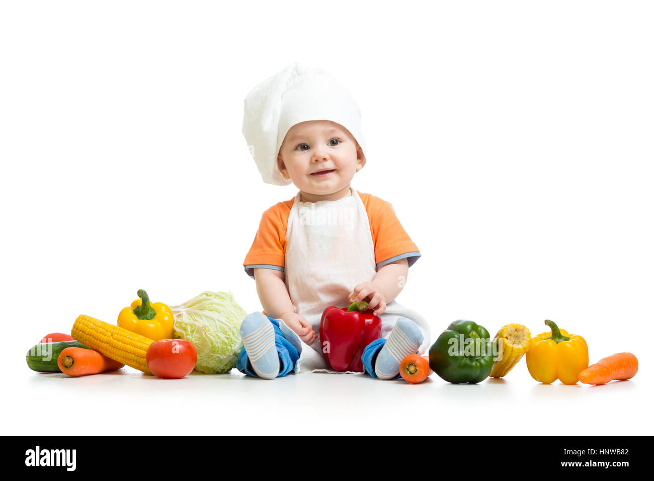 Smiling chef boy isolated on white background Stock Photo - Alamy