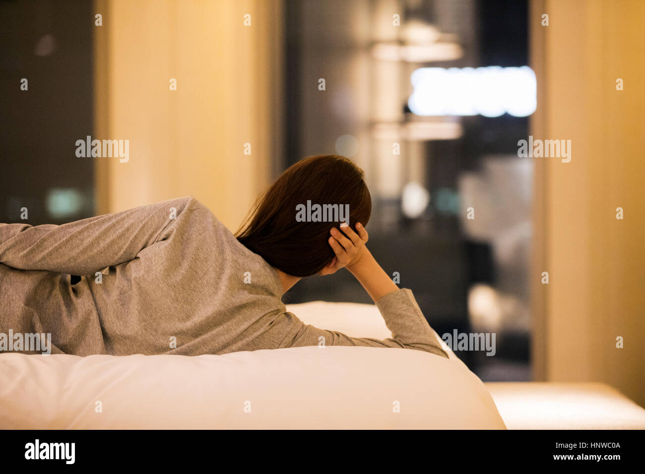 Back of woman resting Stock Photo - Alamy
