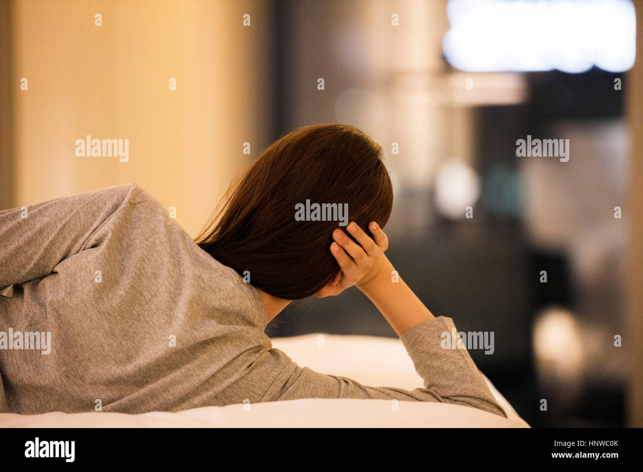 Back of woman resting Stock Photo - Alamy