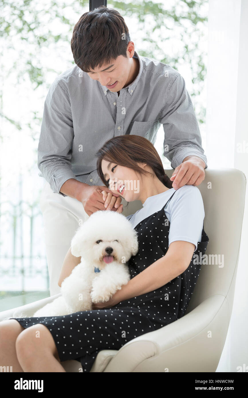 Couple with pet Stock Photo - Alamy