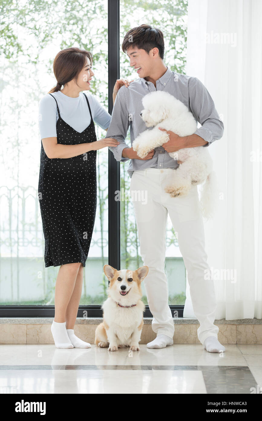 Couple with pets Stock Photo - Alamy