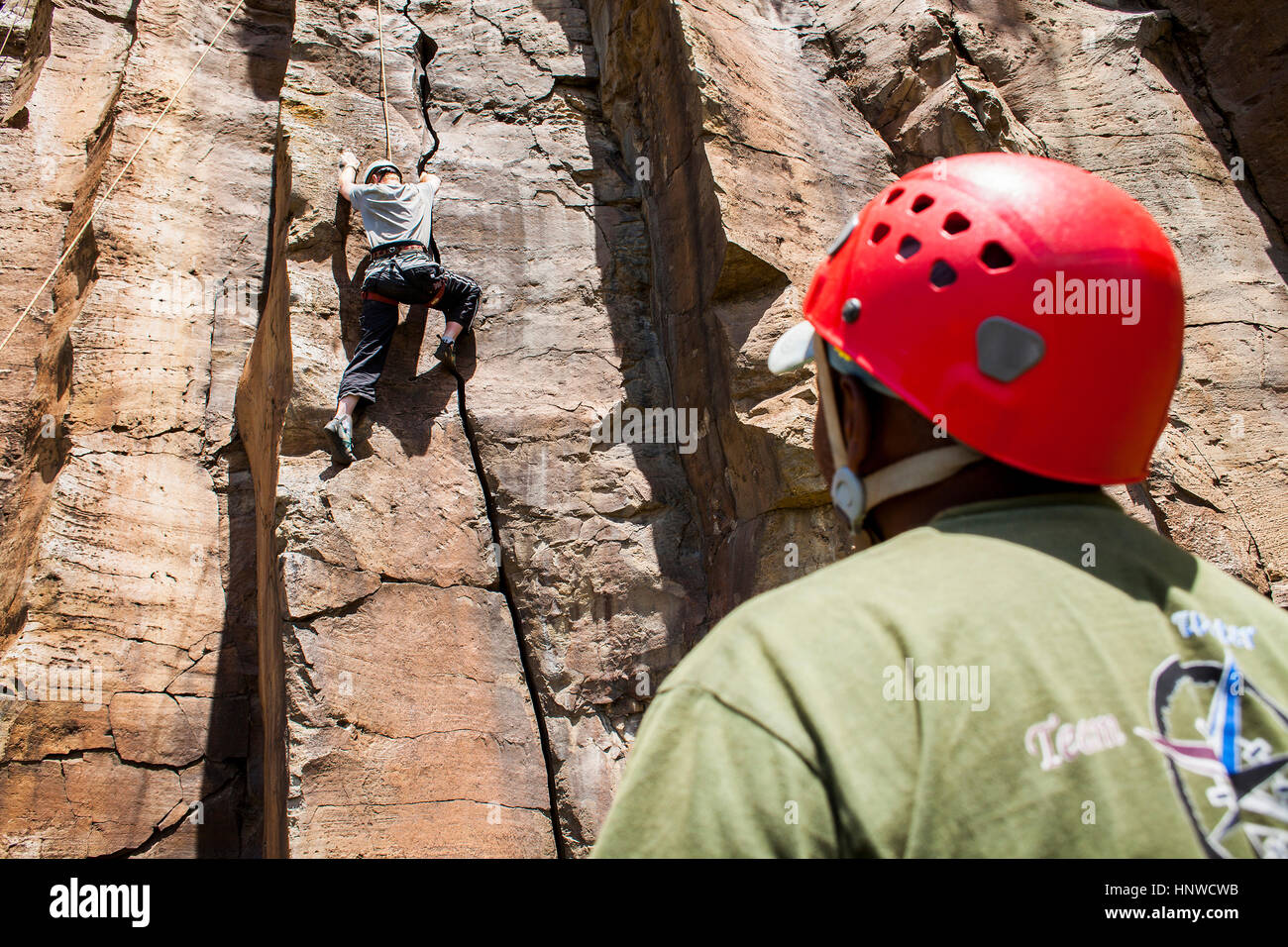 Man climbing, Hells Gate National Park in Kenya Stock Photo - Alamy