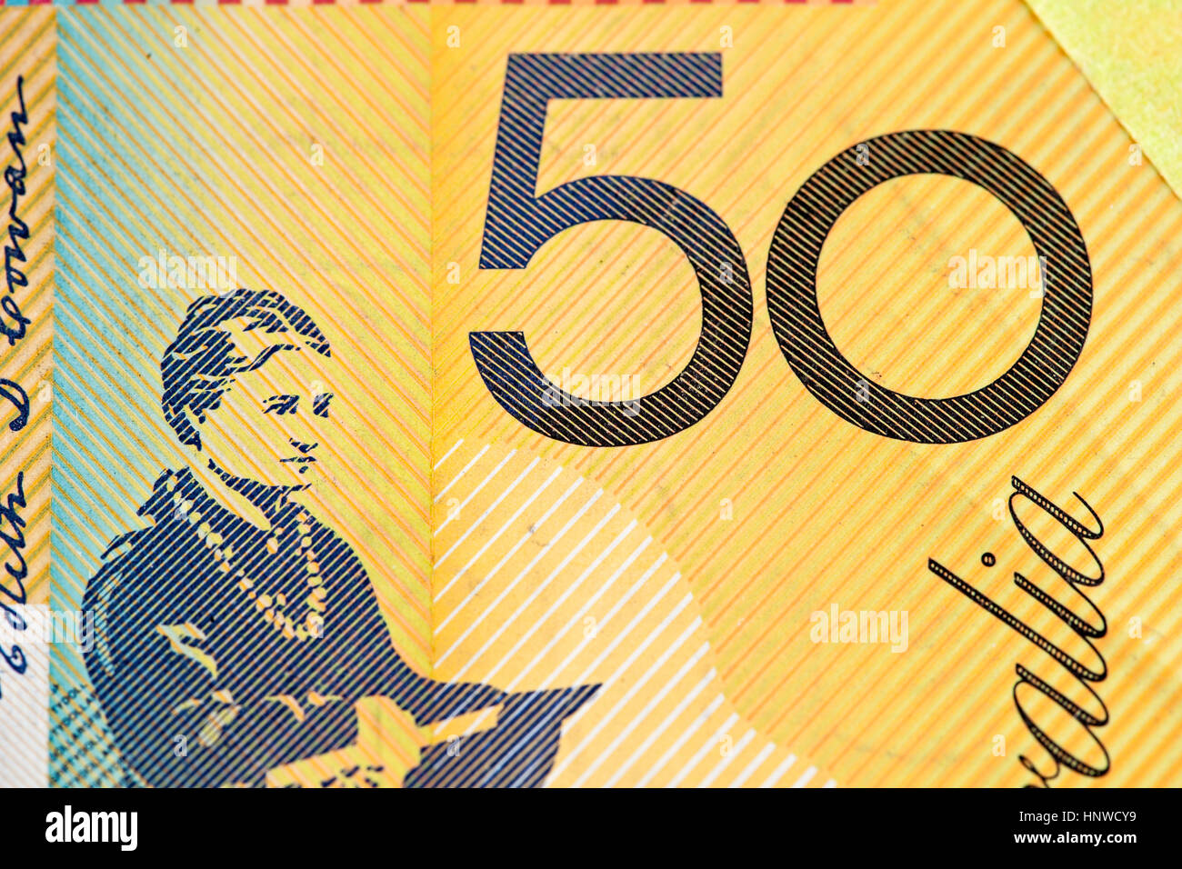 Australian 50 dollar bill fragment closeup showing the number fifty on ...