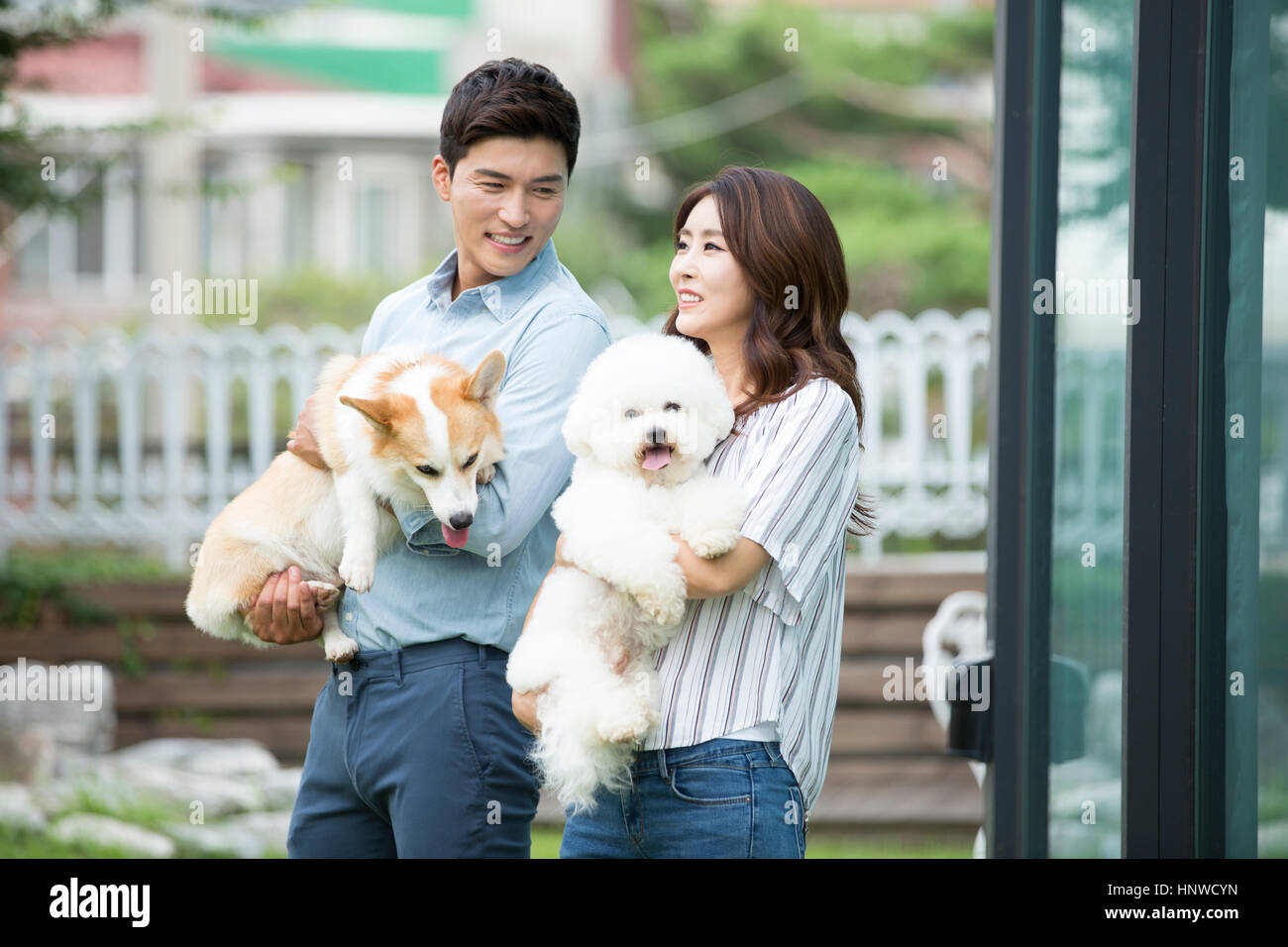 Couple with pet hi-res stock photography and images - Alamy