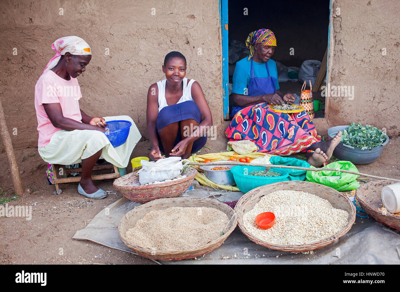 Women cleaning vegetables, Greengrocery, in the fishing village of ...