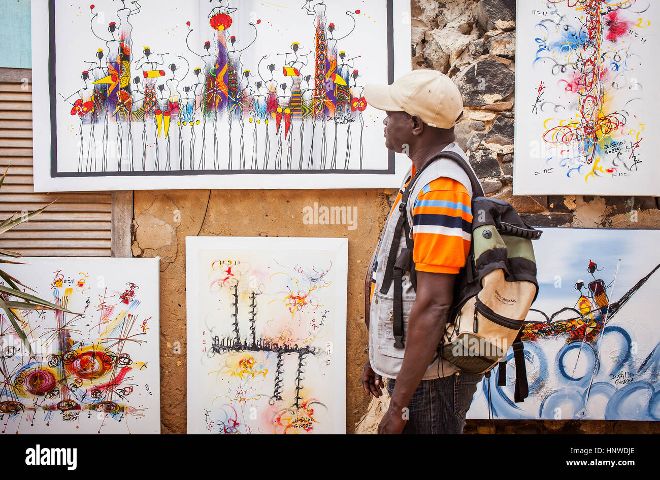 Tourist, in Workshop of Fallow painter, Goree island, near Dakar ...