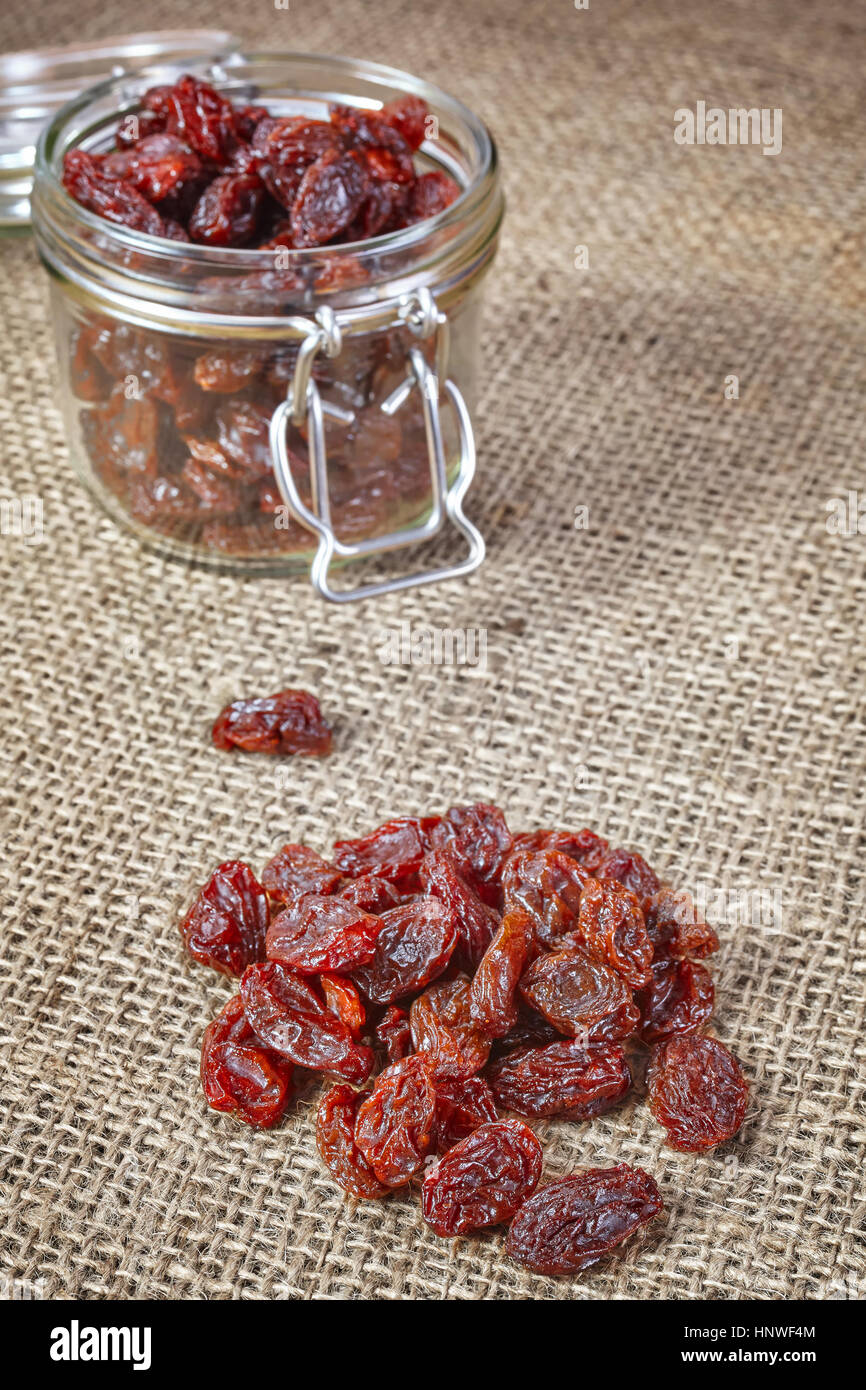 Organic Thompson seedless raisins on a linen background Stock Photo - Alamy