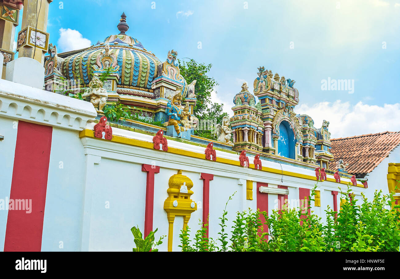 The dome and gate decorations of Munneswaram Kovil consist of colorful ...