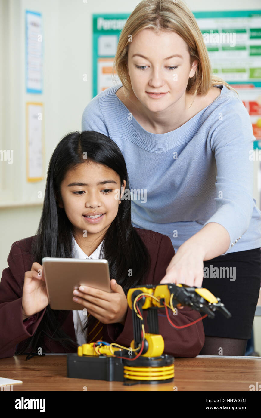 Teacher With Pupils In Science Lesson Studying Robotics Stock Photo - Alamy