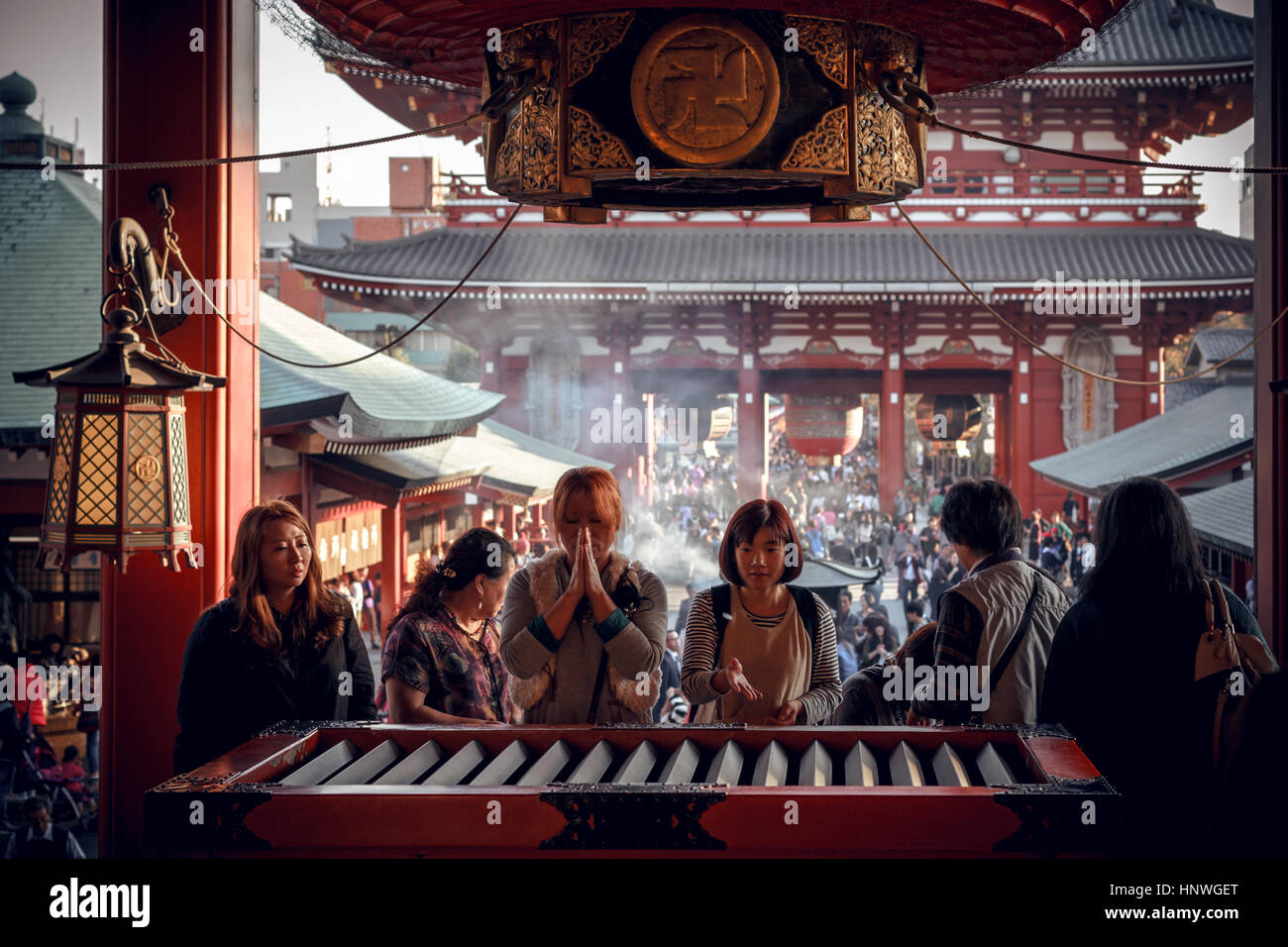 Prayer at Senso-ji Temple, Asakusa, Tokyo, Japan Stock Photo - Alamy