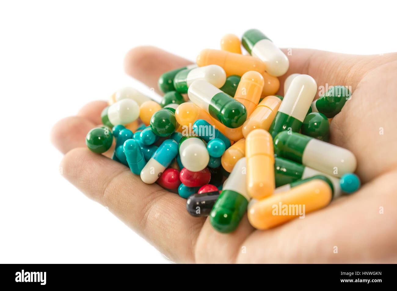 human palm is holding capsules.medical conceptual photo.human hand is ...