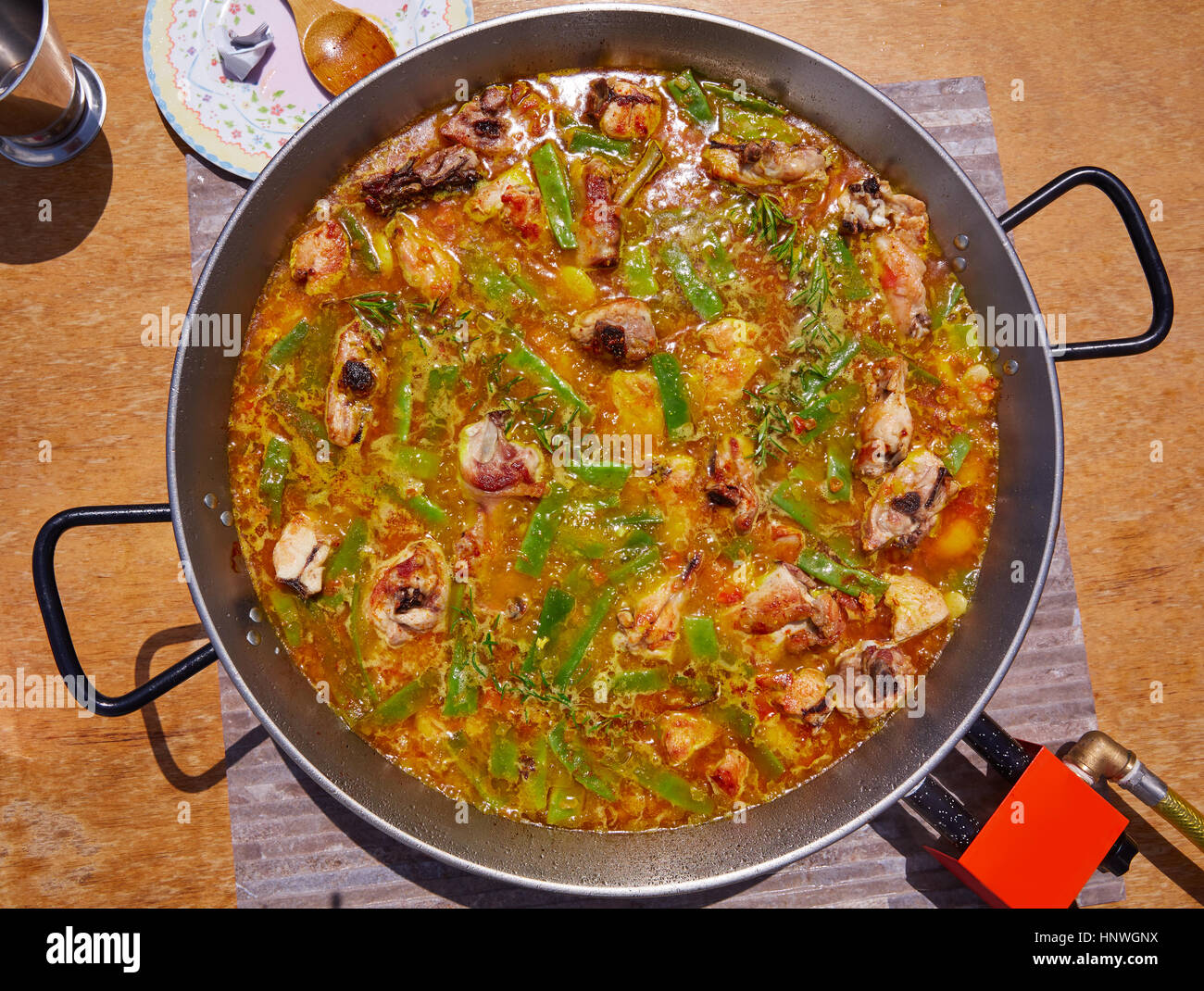 Paella from Spain recipe process boiling broth step by step Stock Photo ...