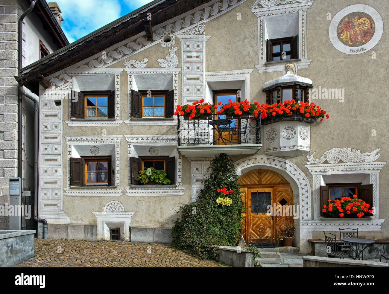 Typical Engadine house at the La Plazetta square, Scuol, Engadine ...