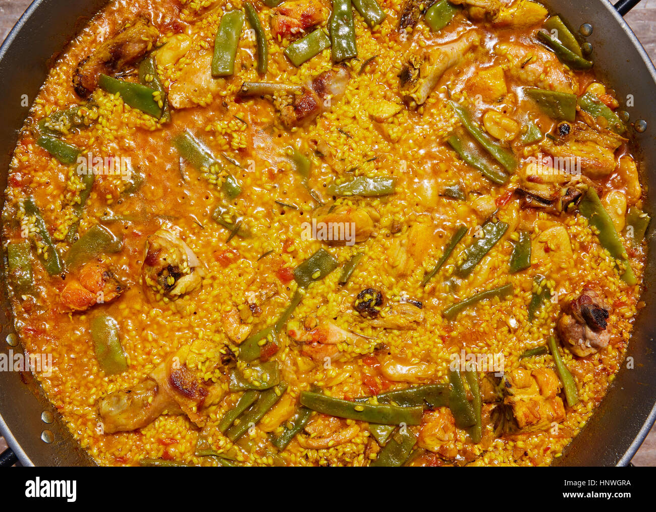 Paella from Spain chicken and rabbit rice recipe from Valencia Stock ...