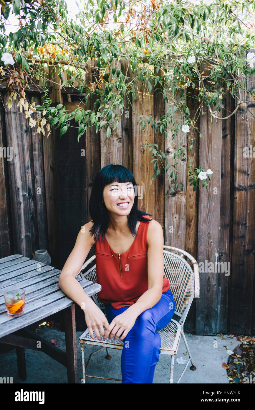 Woman at garden party Stock Photo - Alamy