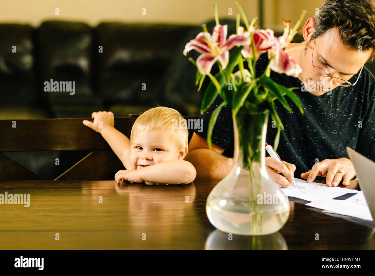 Father writing hi-res stock photography and images - Alamy