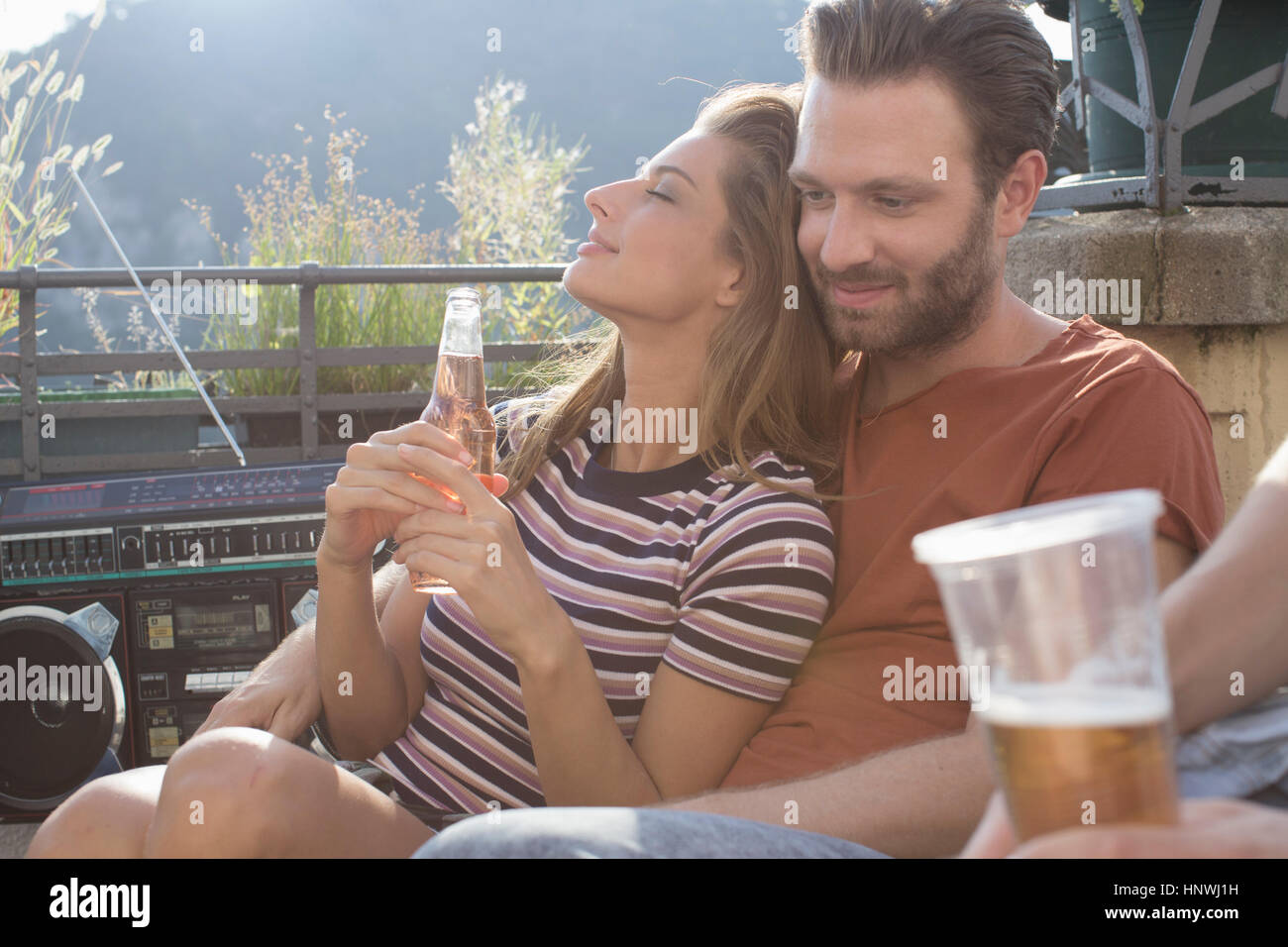 Woman sitting on man lap hi-res stock photography and images - Alamy