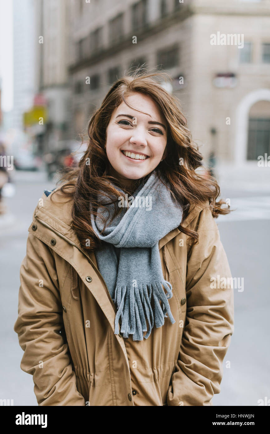 Woman smiling outdoors hi-res stock photography and images - Alamy