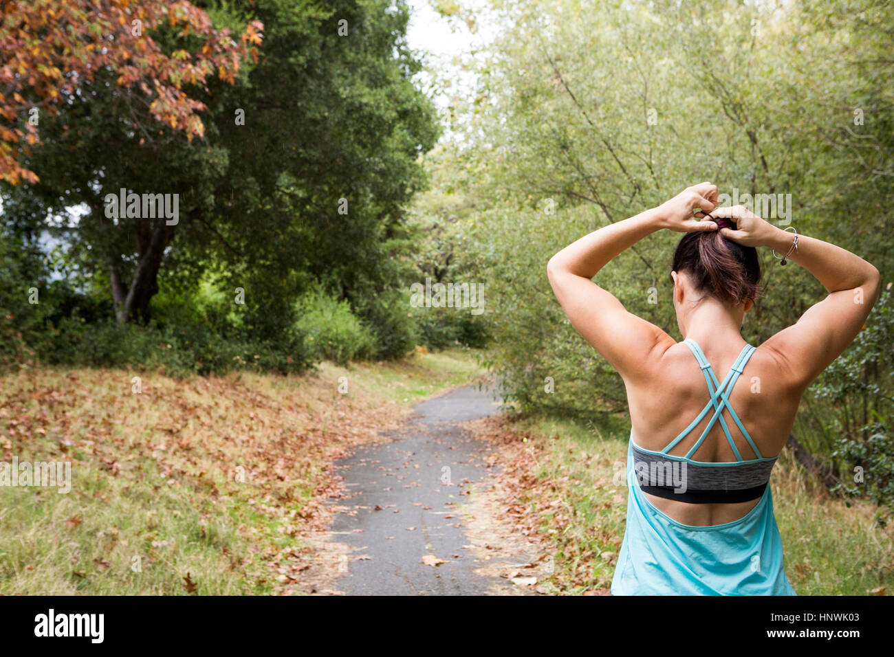 Rear view of female runner hi-res stock photography and images - Alamy