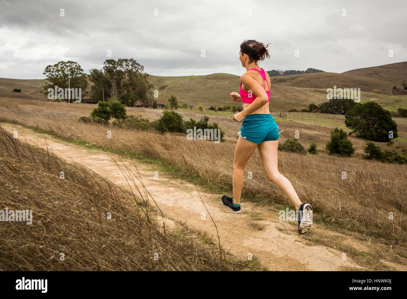 Female runner in shorts hi-res stock photography and images - Alamy