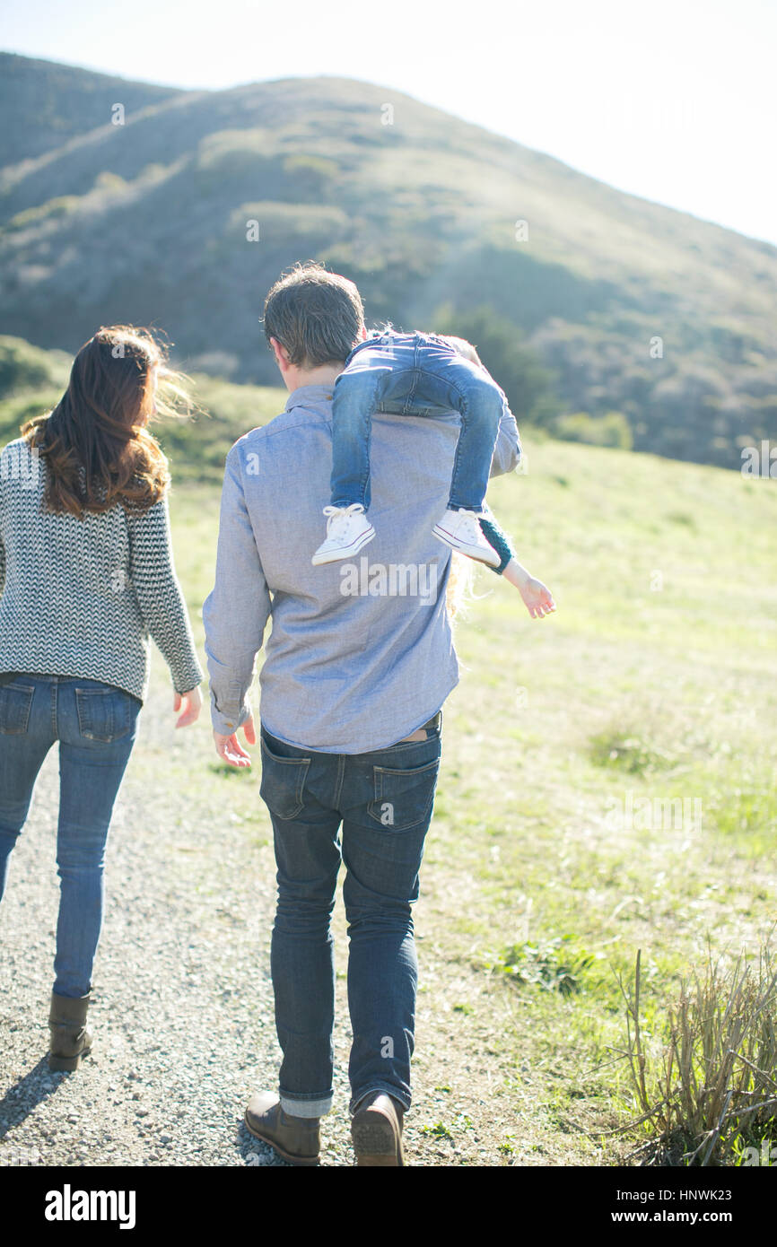 Man carrying woman over shoulder hi-res stock photography and images ...