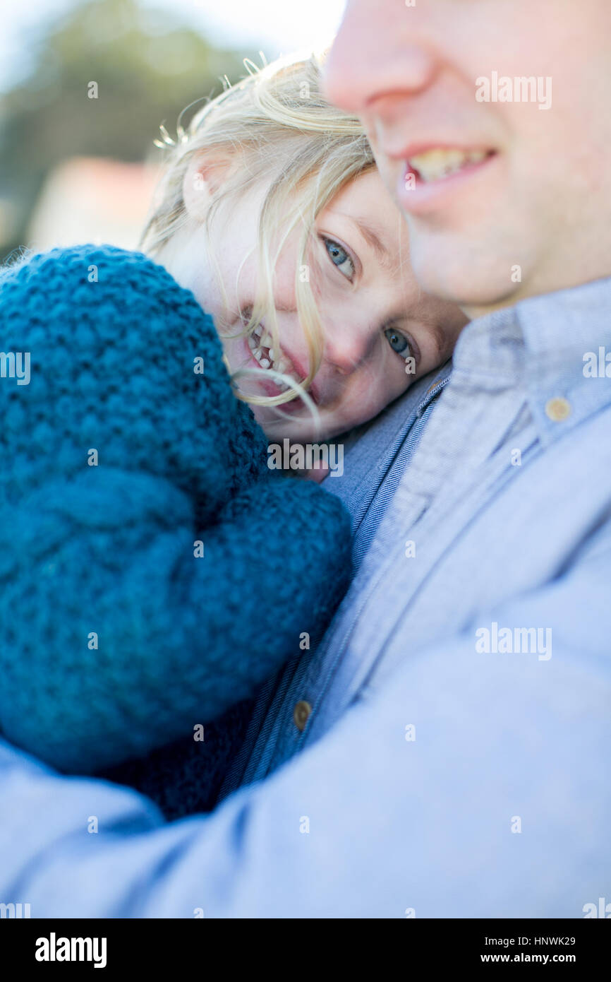 Child being carried hi-res stock photography and images - Alamy