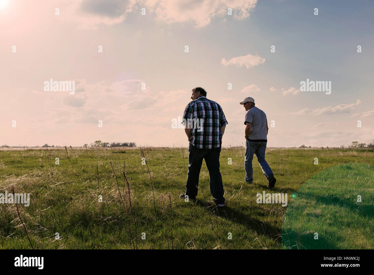 Two men walking hi-res stock photography and images - Alamy