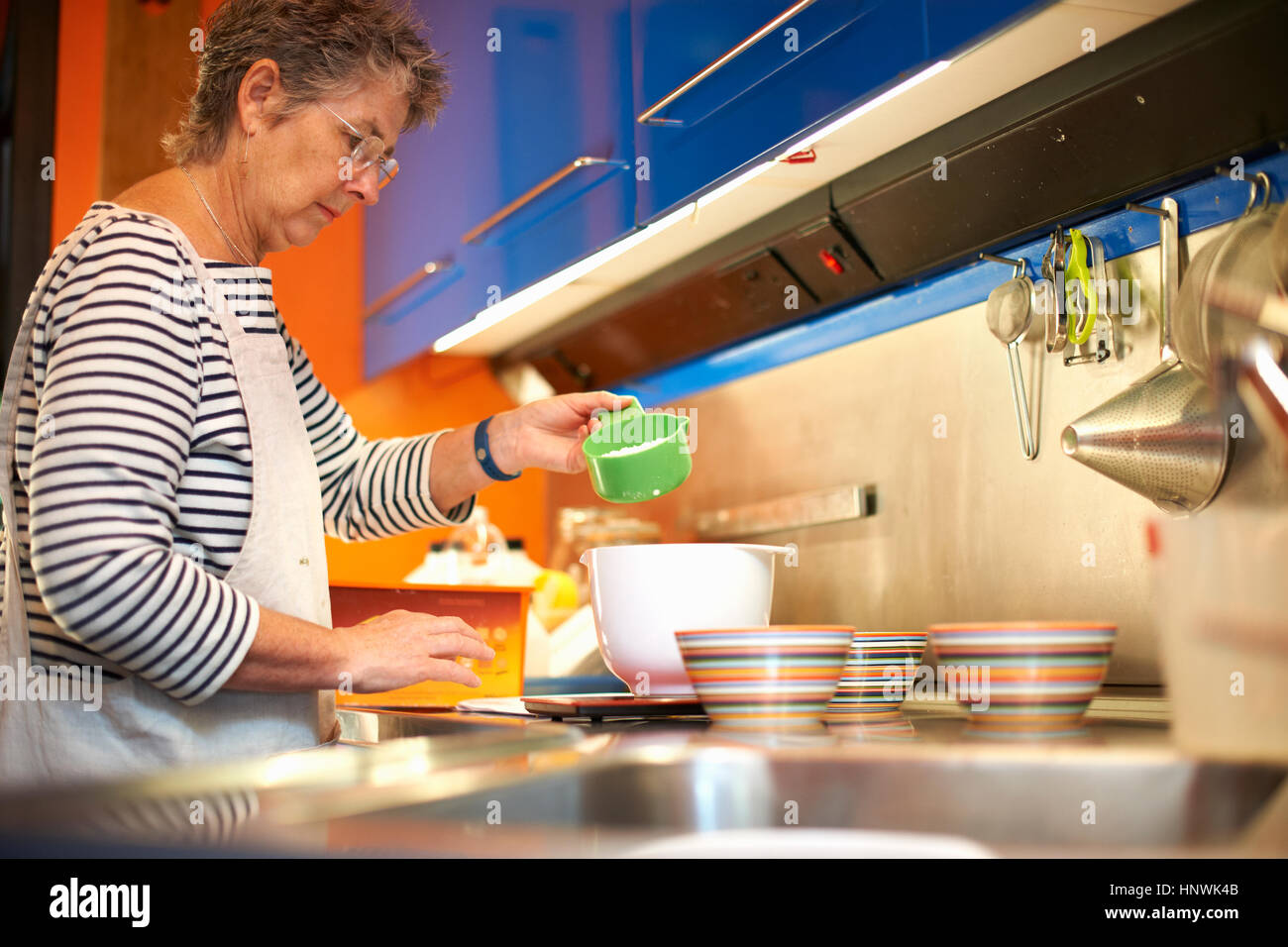 Students Measuring And Cooking